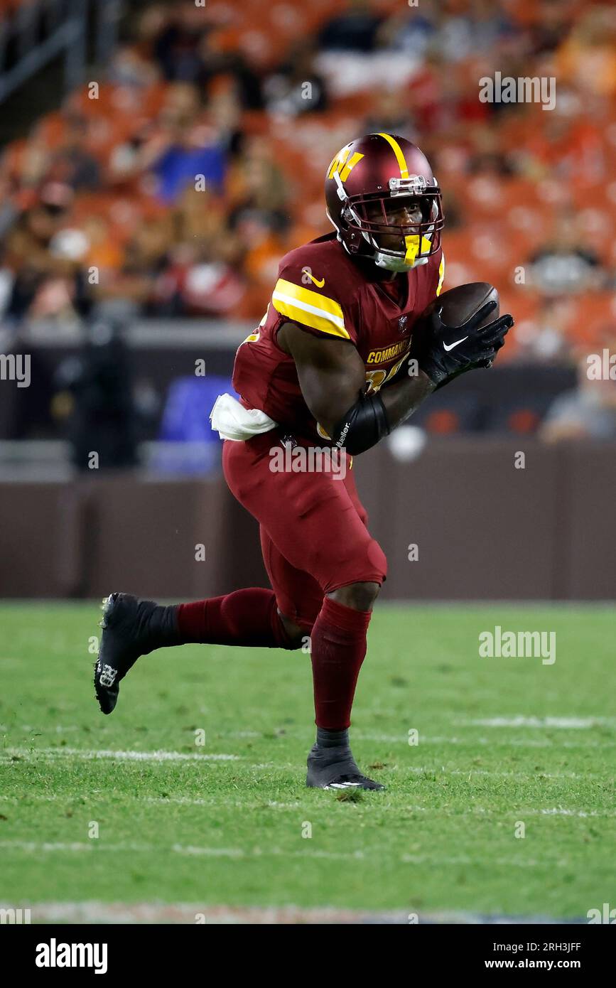 Washington Commanders running back Derrick Gore (38) runs with the ball ...