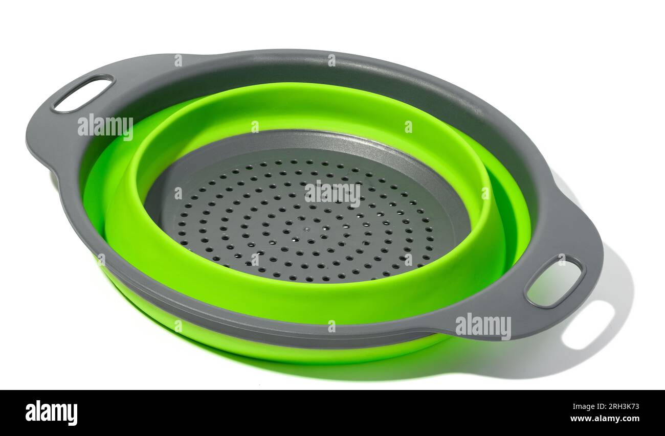 Plastic green collapsible colander on white isolated background Stock ...