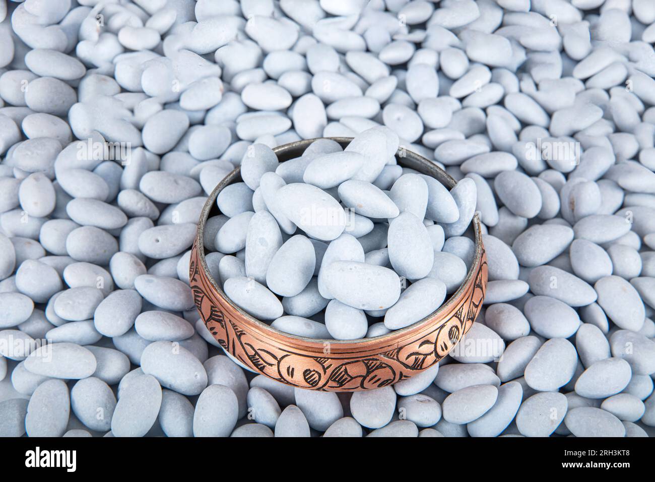 Mardin almond candy. Turkish Badem Sekeri, almond, top view of blue ...