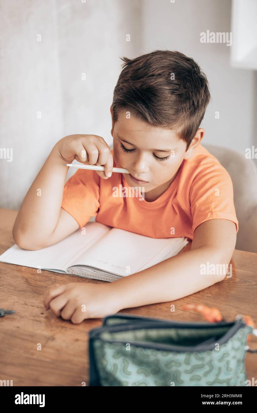 School boy with pen hi-res stock photography and images - Alamy