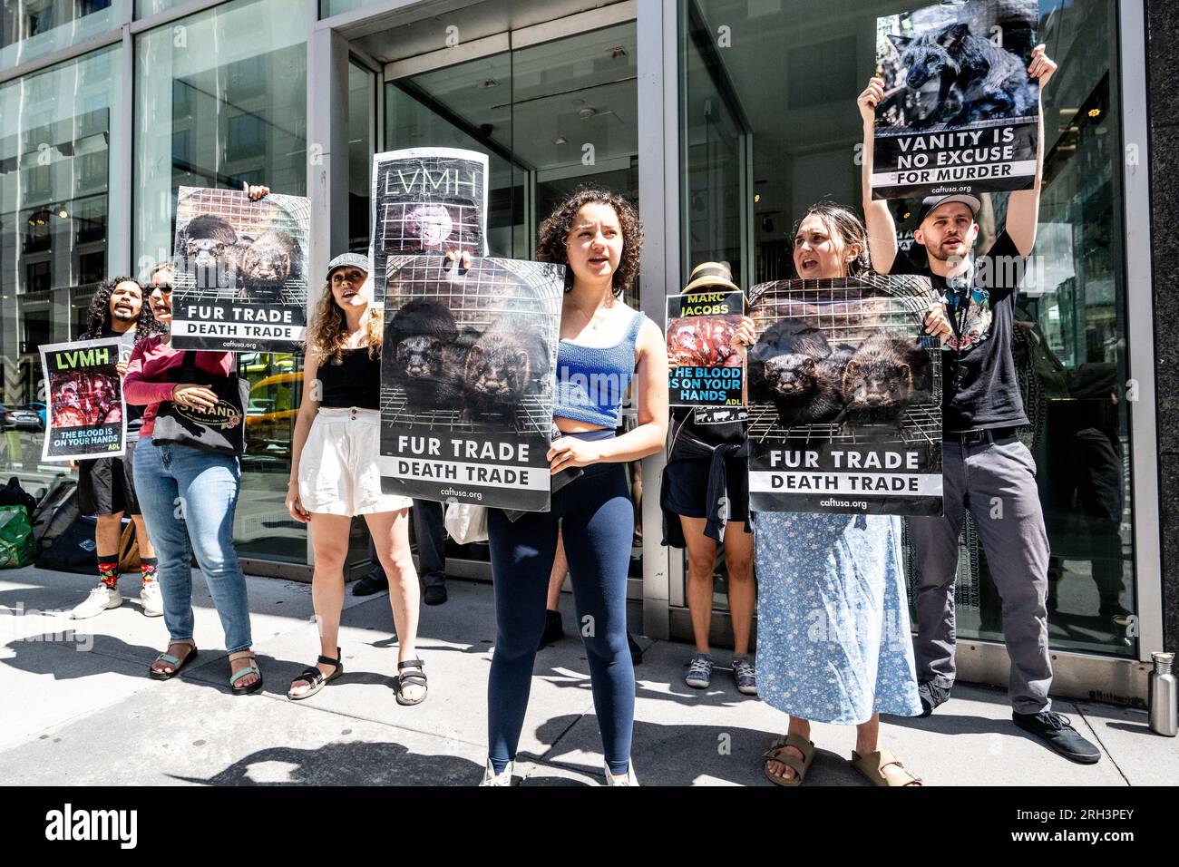 New York City, United States. 13th Aug, 2023. People holding signs at a ...