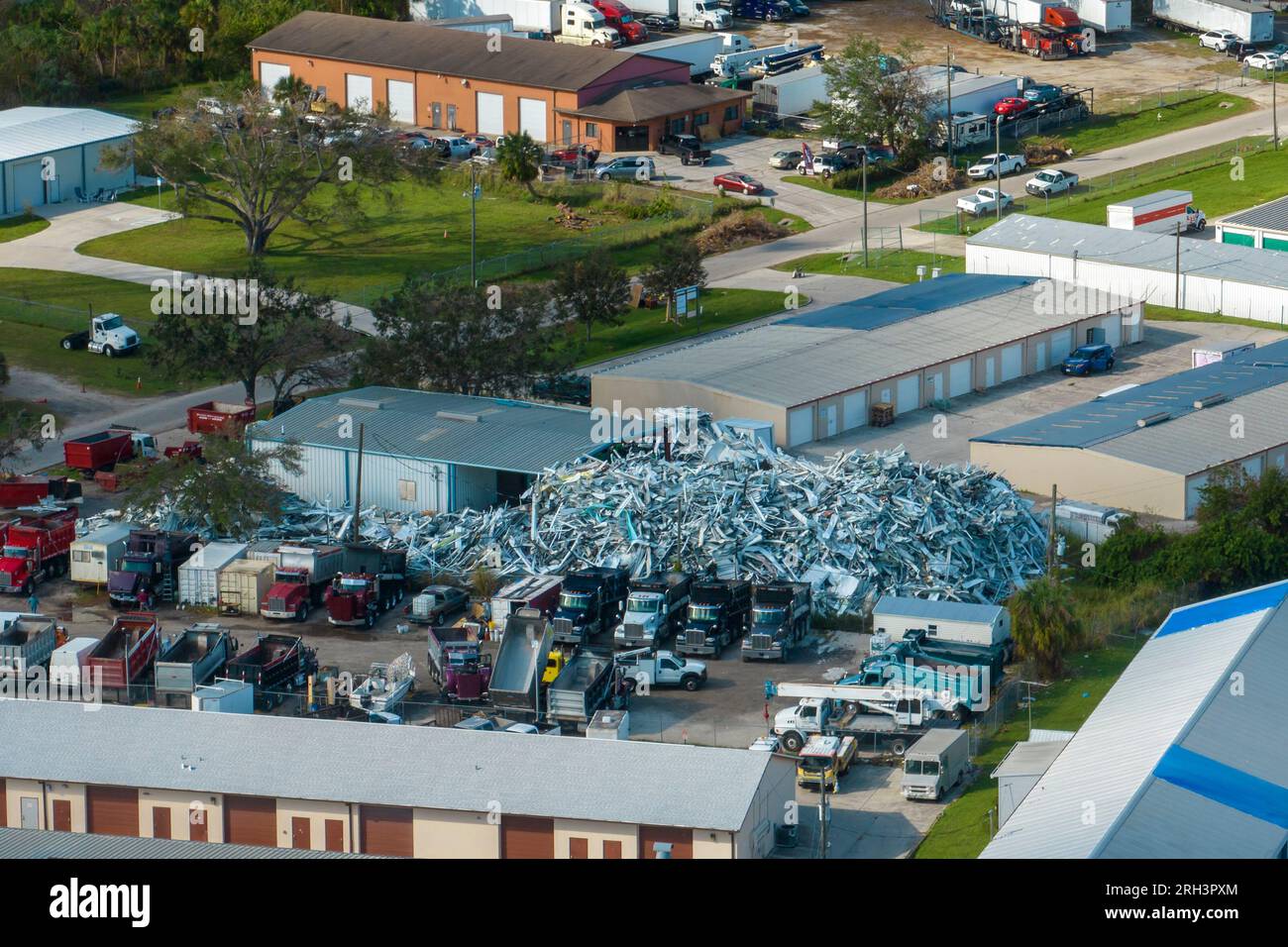 Beg pile of scrap aluminum metal siding from ruined houses after ...