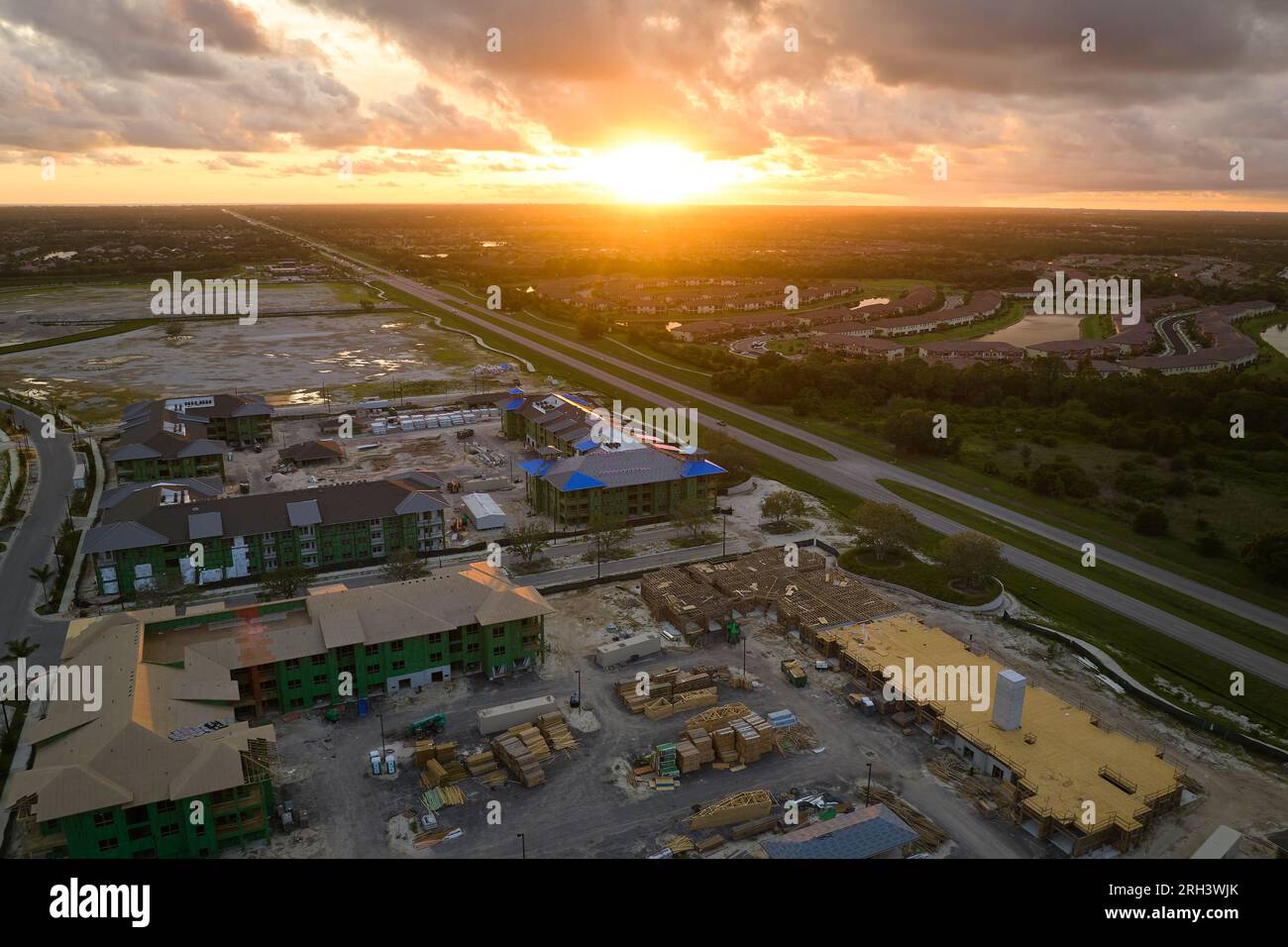 Top view of apartment buildings under construction in new developing ...