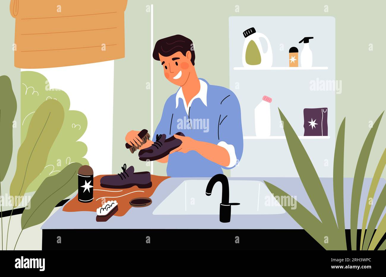 Man cleans his shoes with brush. Footwear polish and care process. Guy ...