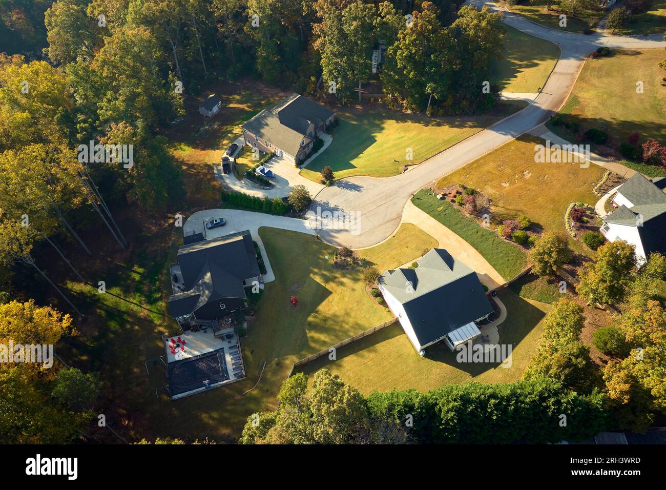 View from above of expensive residential houses between yellow fall ...