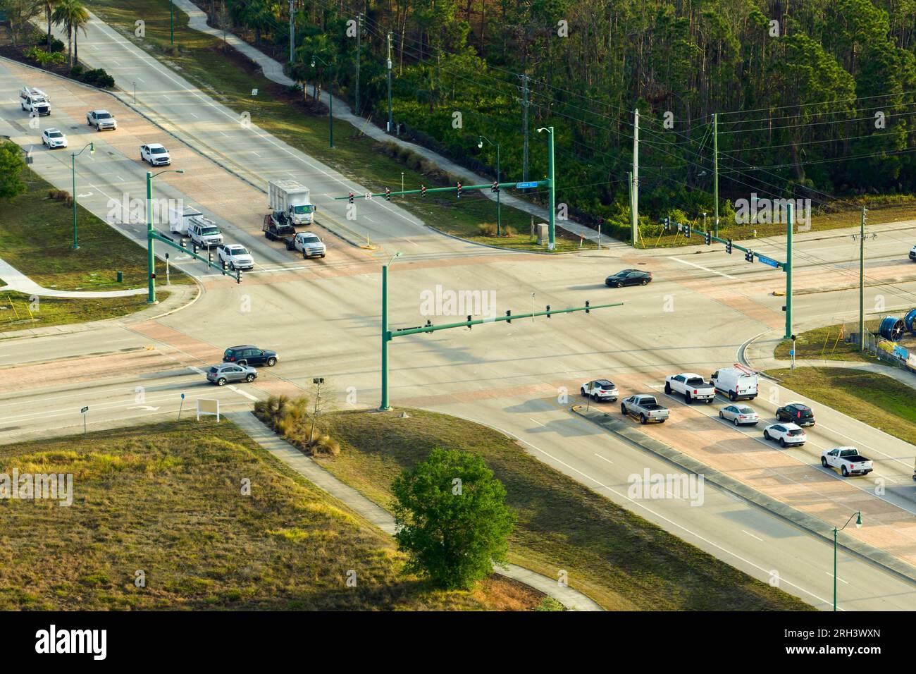 View from above of wide multilane road with driving vehicles at ...