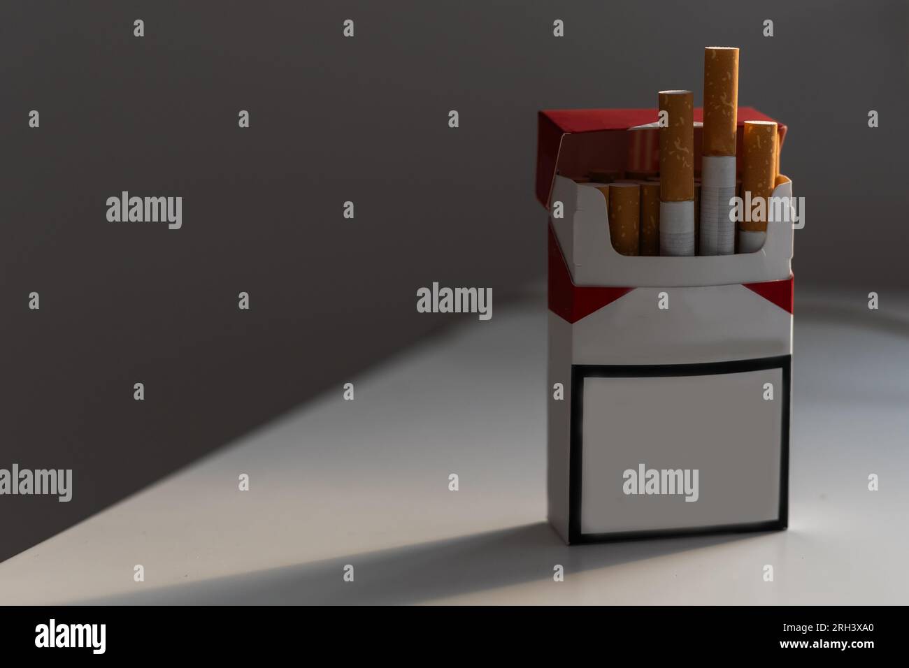 Smoking concept. Blank no name cigarettes packets isolated on black ...