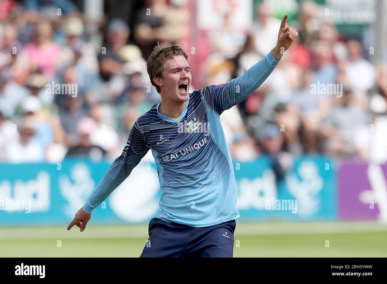 Jack Shutt of Yorkshire claims the wicket of Charlie Allison during ...