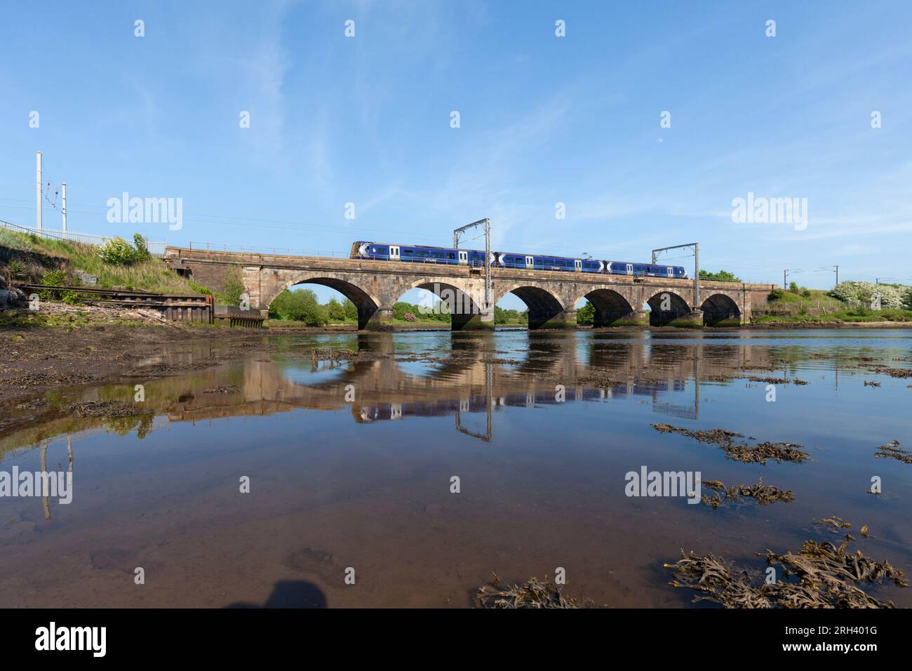 A Scotrail class 380 electric train crossing Queens Viaduct, Irvine ...