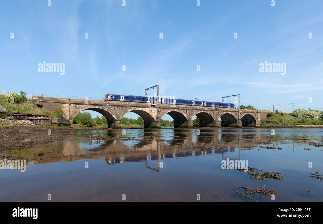 A Scotrail class 380 electric train crossing Queens Viaduct, Irvine ...