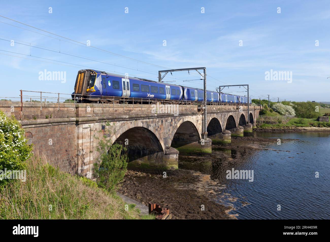 A Scotrail class 380 electric train crossing Queens Viaduct, Irvine ...
