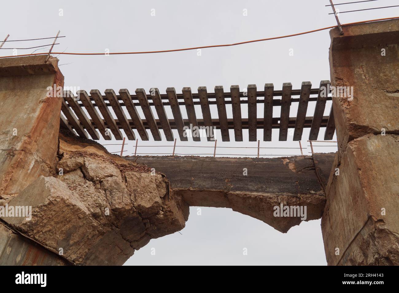 Railway bridge damaged by shelling. War in Ukraine. Russian invasion of ...