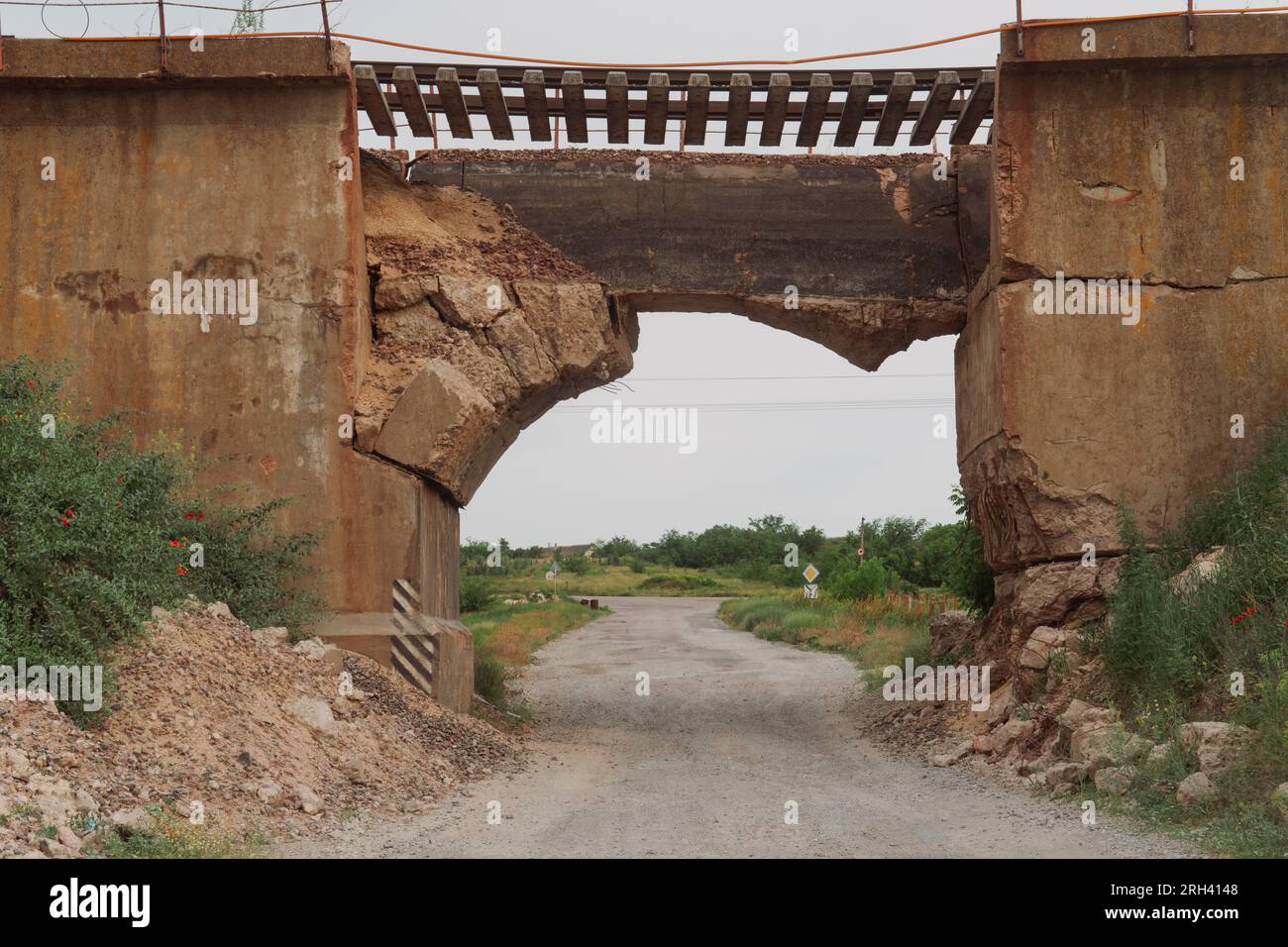 Railway bridge damaged by shelling. War in Ukraine. Russian invasion of ...
