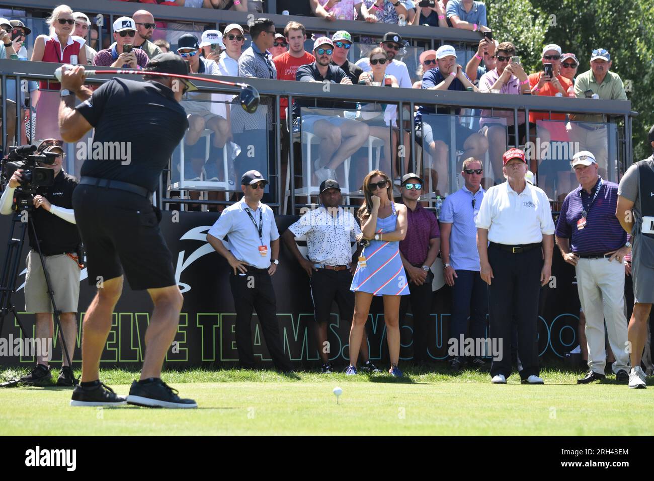 Phil Mickelson prepares to swing his put. Phil Mickelson plays in LIV ...
