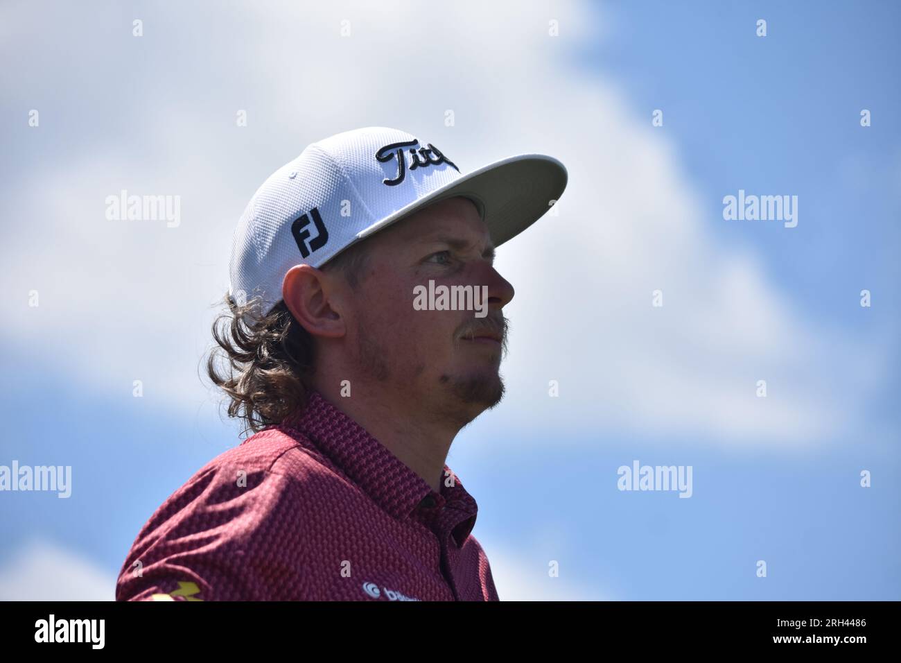 Cam Smith walks off the green after swinging his put. Cam Smith plays ...