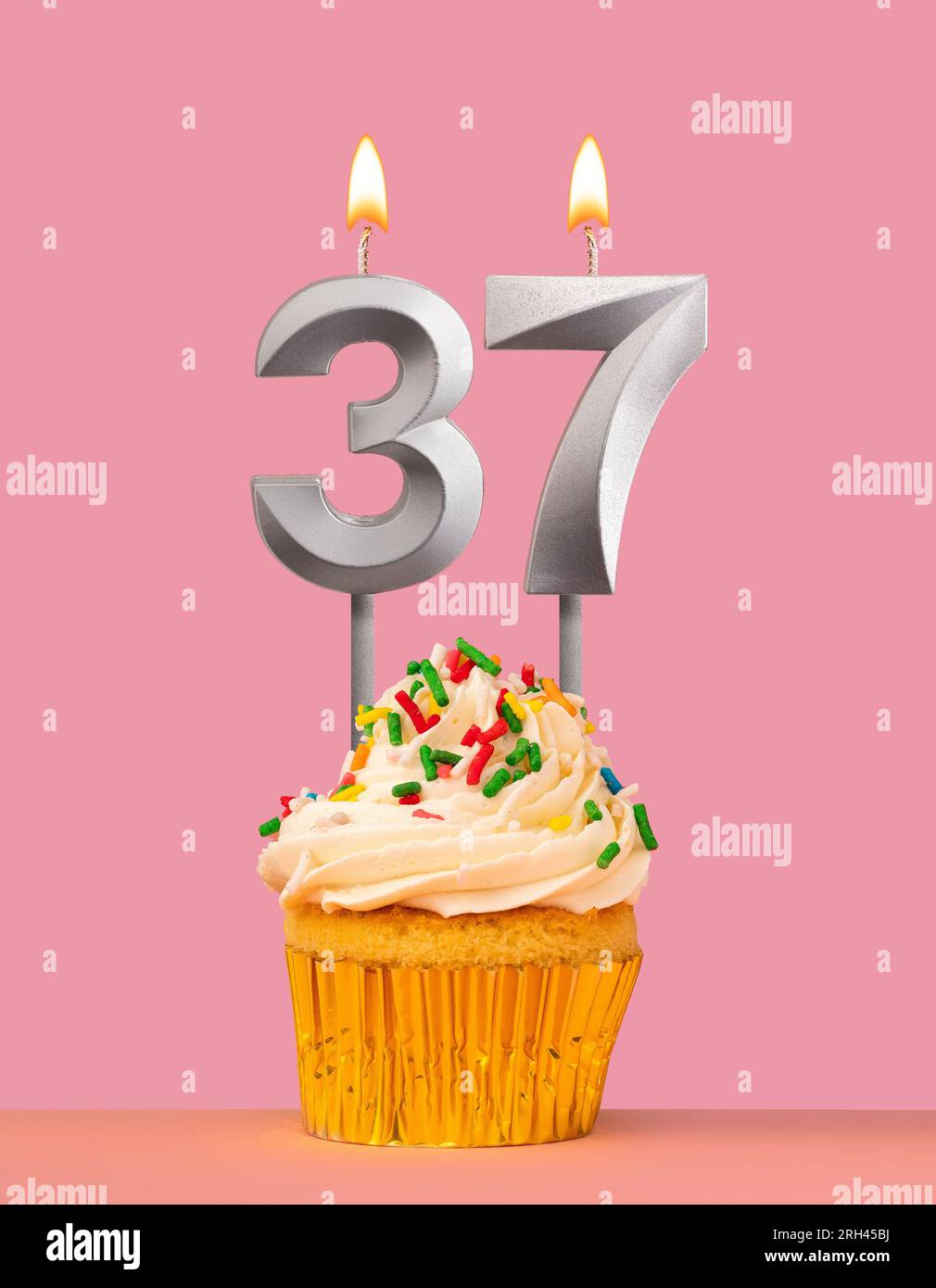 Birthday card with cupcake and candle number 37 Stock Photo - Alamy