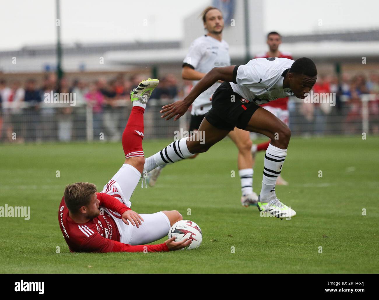 Hugo Magnetti of Stade Brestois and Januel Belocian of Stade Rennais ...