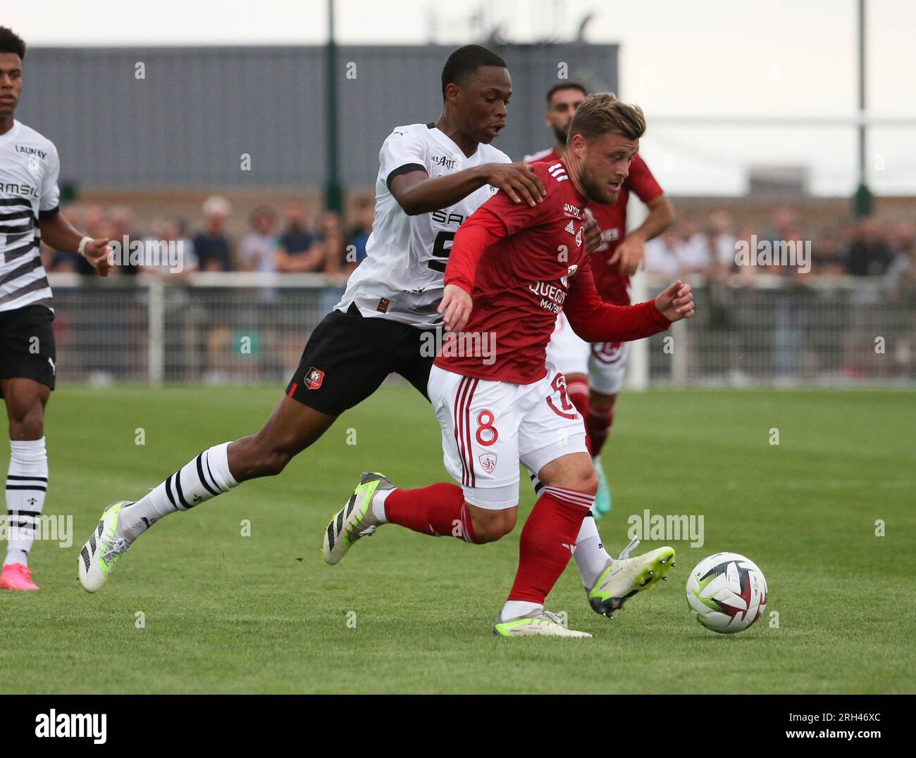 Hugo Magnetti of Stade Brestois and Januel Belocian of Stade Rennais ...