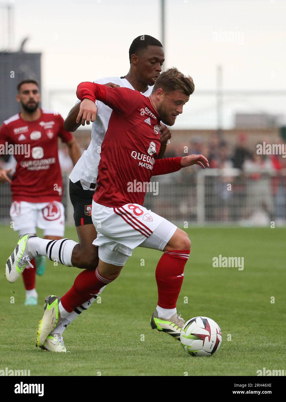 Hugo Magnetti of Stade Brestois and Januel Belocian of Stade Rennais ...