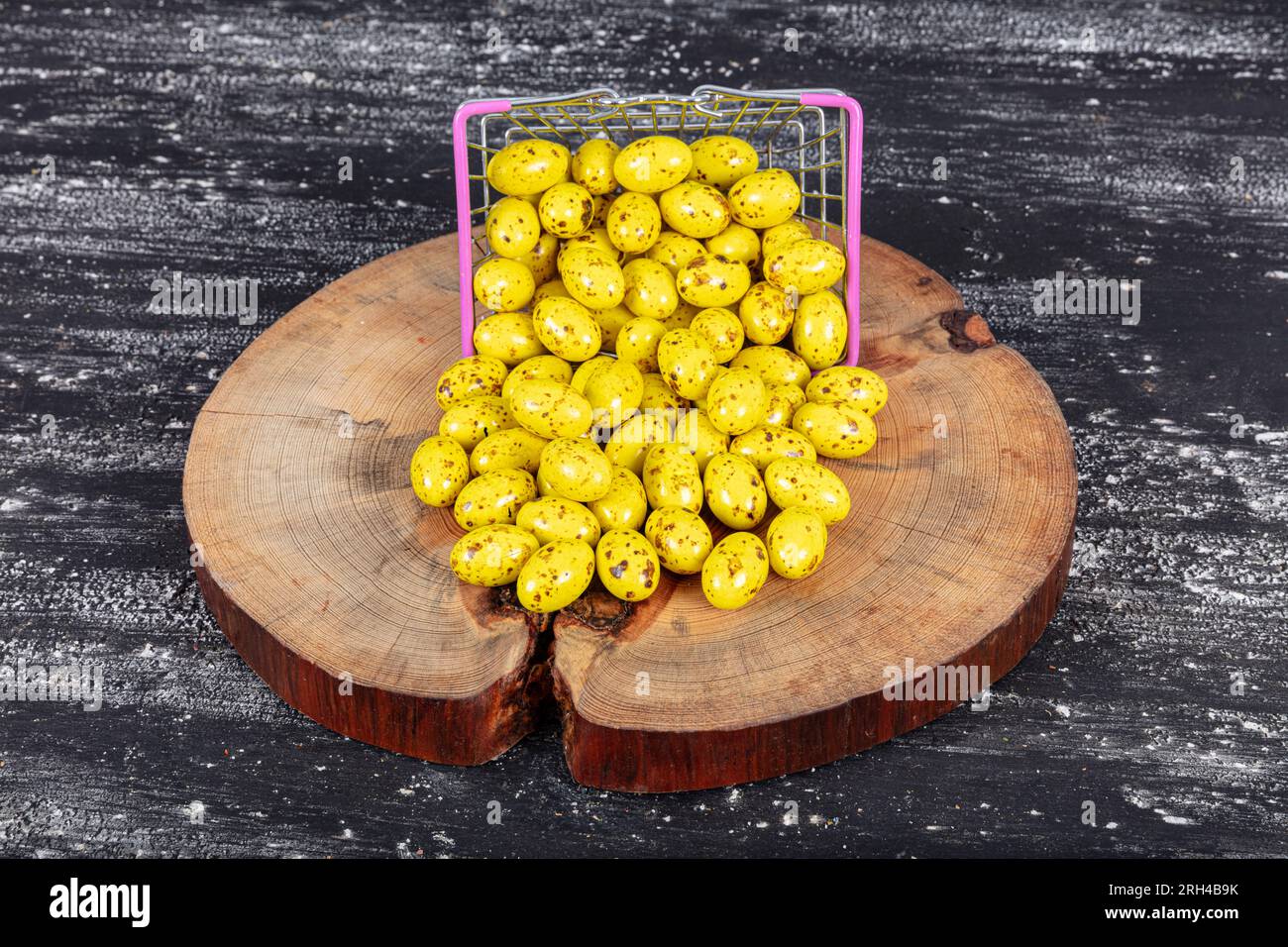 Heap of sugared almonds and hazelnuts dragees in chocolate isolated on ...