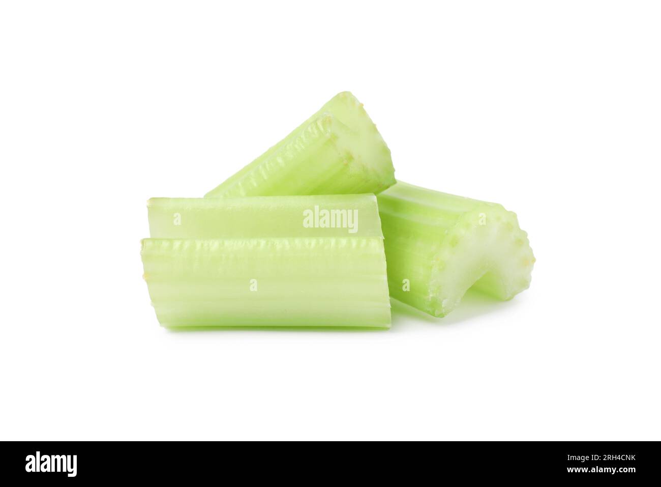 Pieces of fresh cut celery isolated on white Stock Photo - Alamy