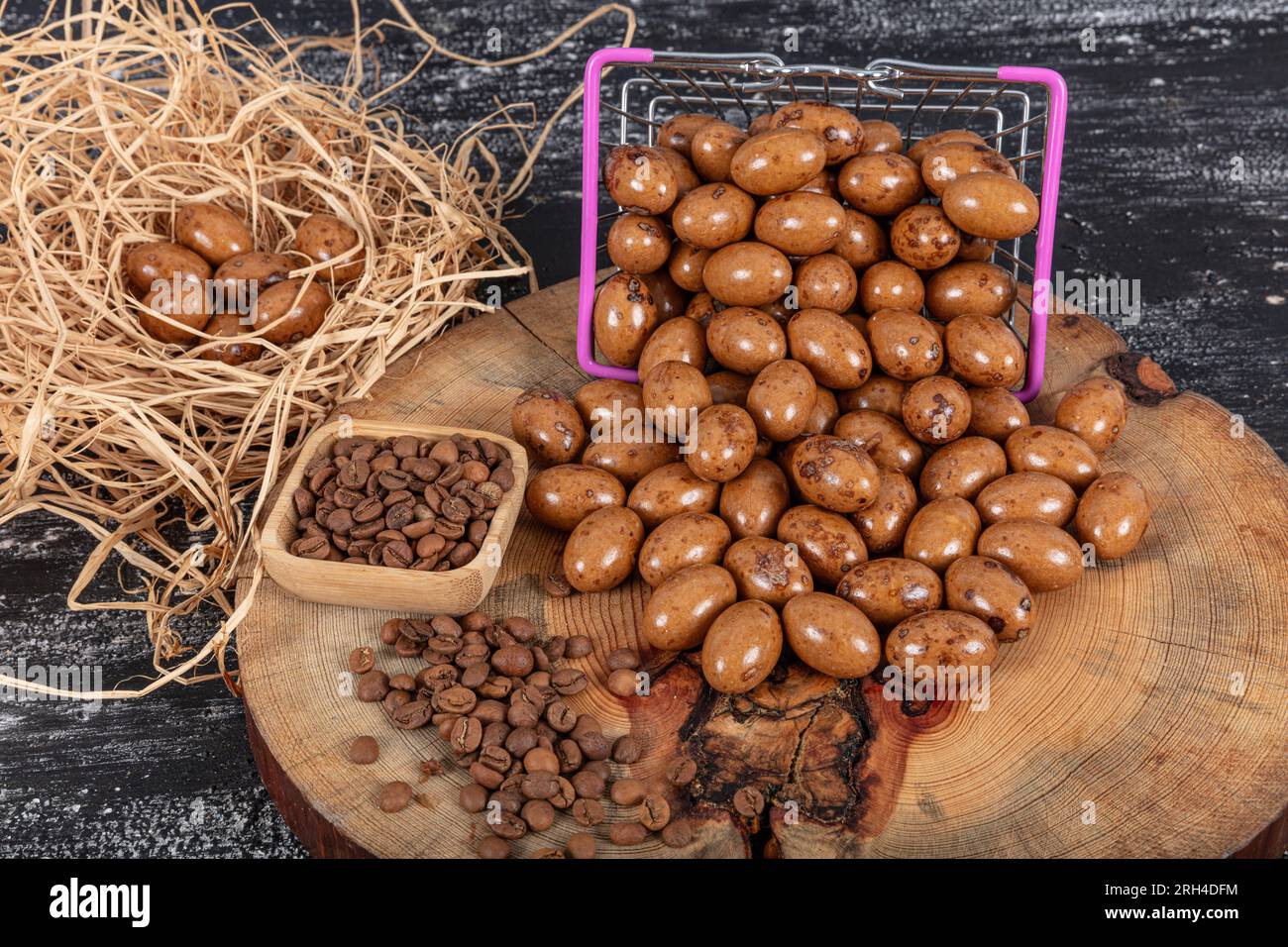 Heap of sugared almonds and hazelnuts dragees in chocolate isolated on ...