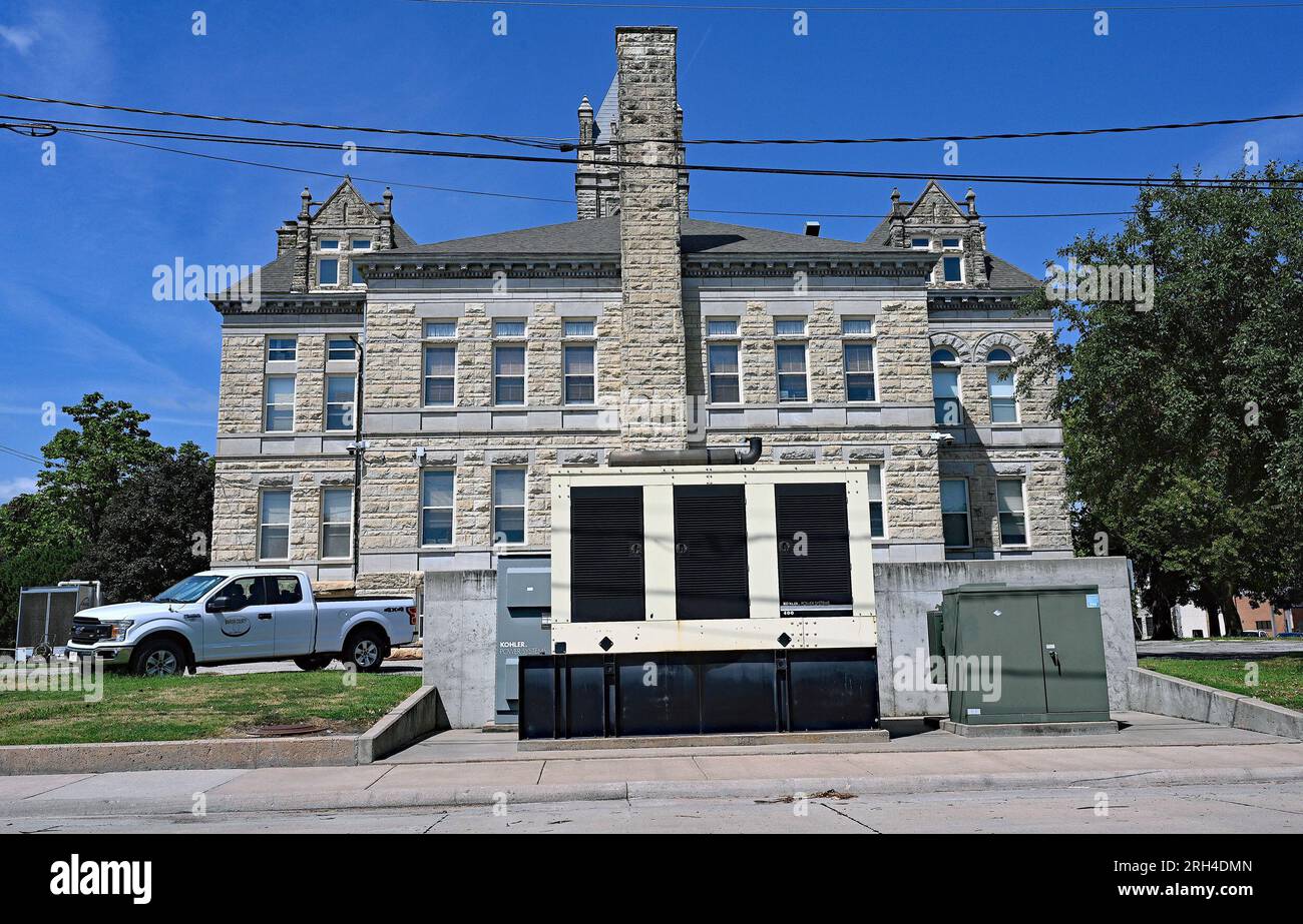 MARION, KANSAS - AUGUST 12, 2023 Stand by generator located in the rear ...