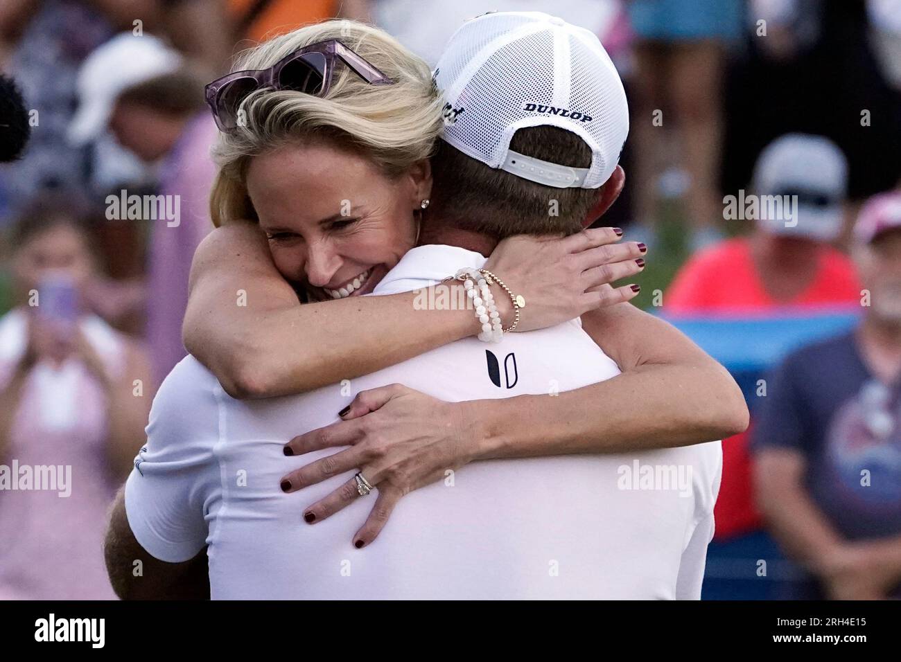 Lucas Glover gets a hug from his wife Krista after winning the St. Jude ...