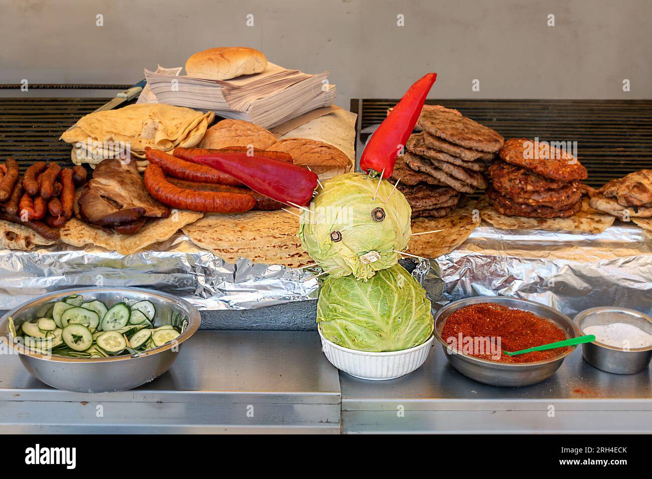 Market stall selling burgers and other food on local fair Stock Photo ...