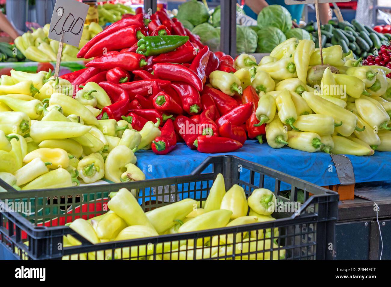 Fresh organic vegetable peppers pile on market stall Stock Photo - Alamy
