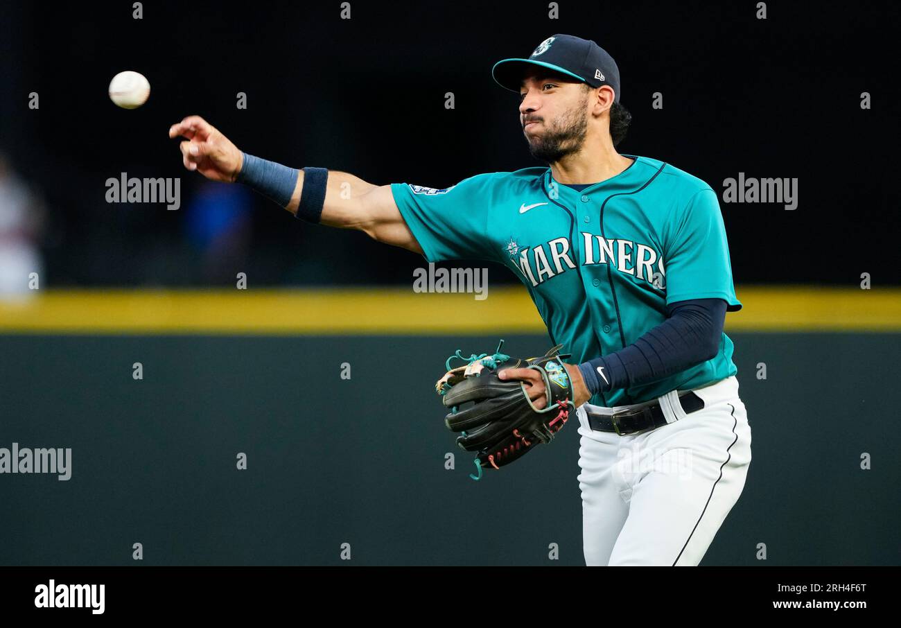 Seattle Mariners second baseman Jose Caballero throws during a baseball ...