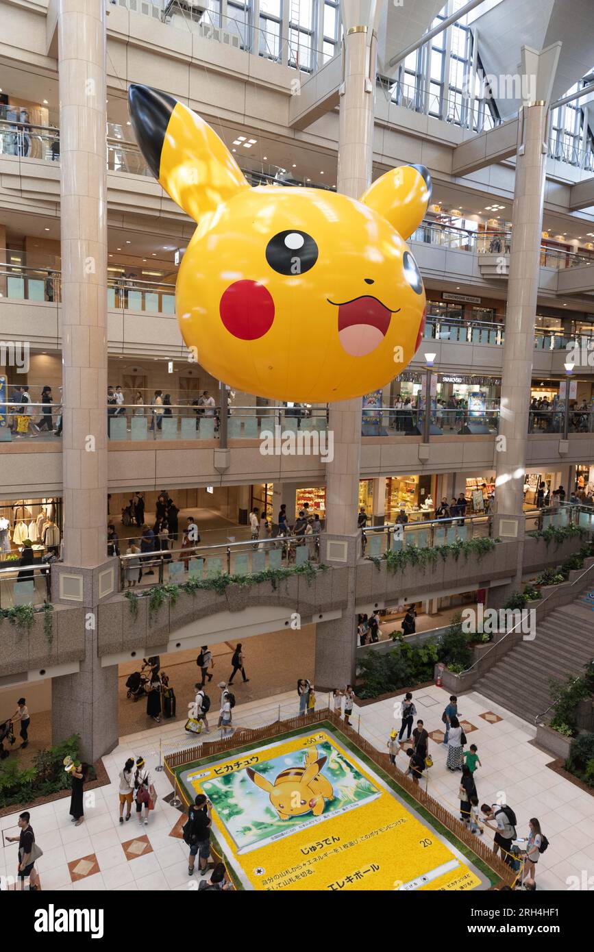 Pikachu air balloon hangs inside a shopping mall during Pokemon World ...