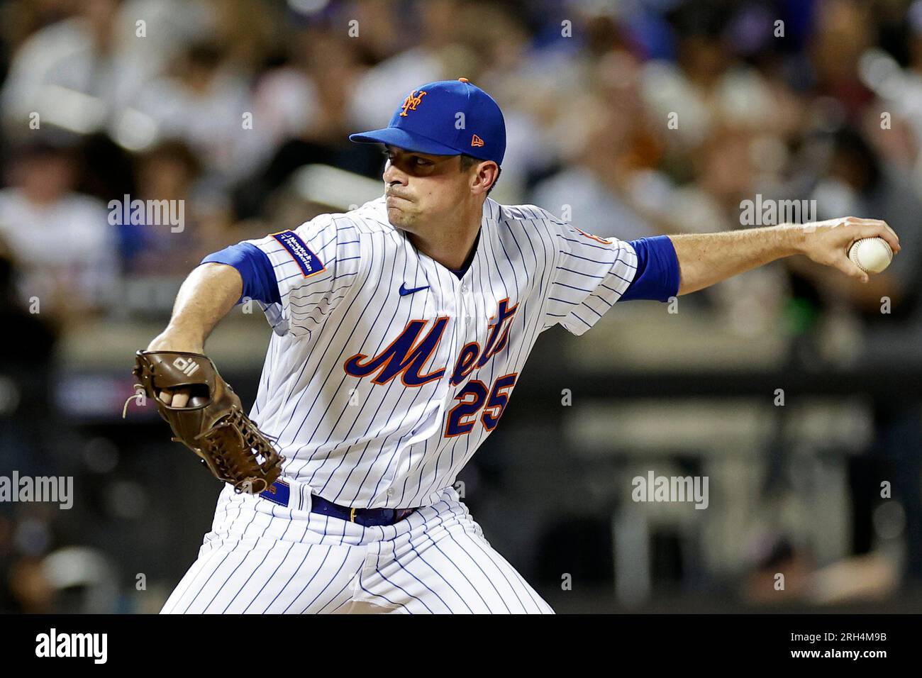 New York Mets pitcher Brooks Raley throws against the Atlanta Braves during the eighth inning of ...