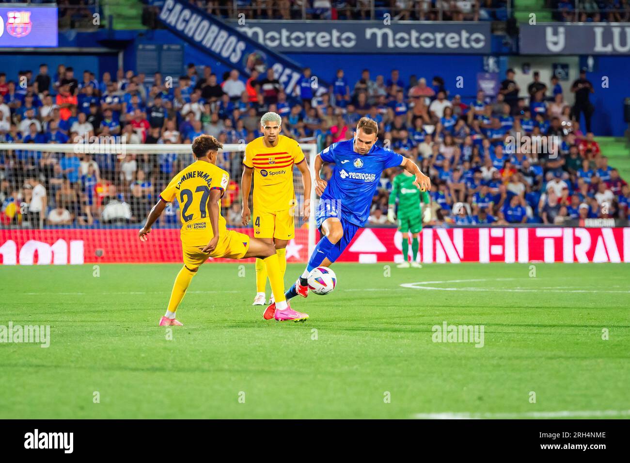 Getafe, Spain. 13th Aug, 2023. (L-R) Lamine Yamal (Barcelona) and Enes ...