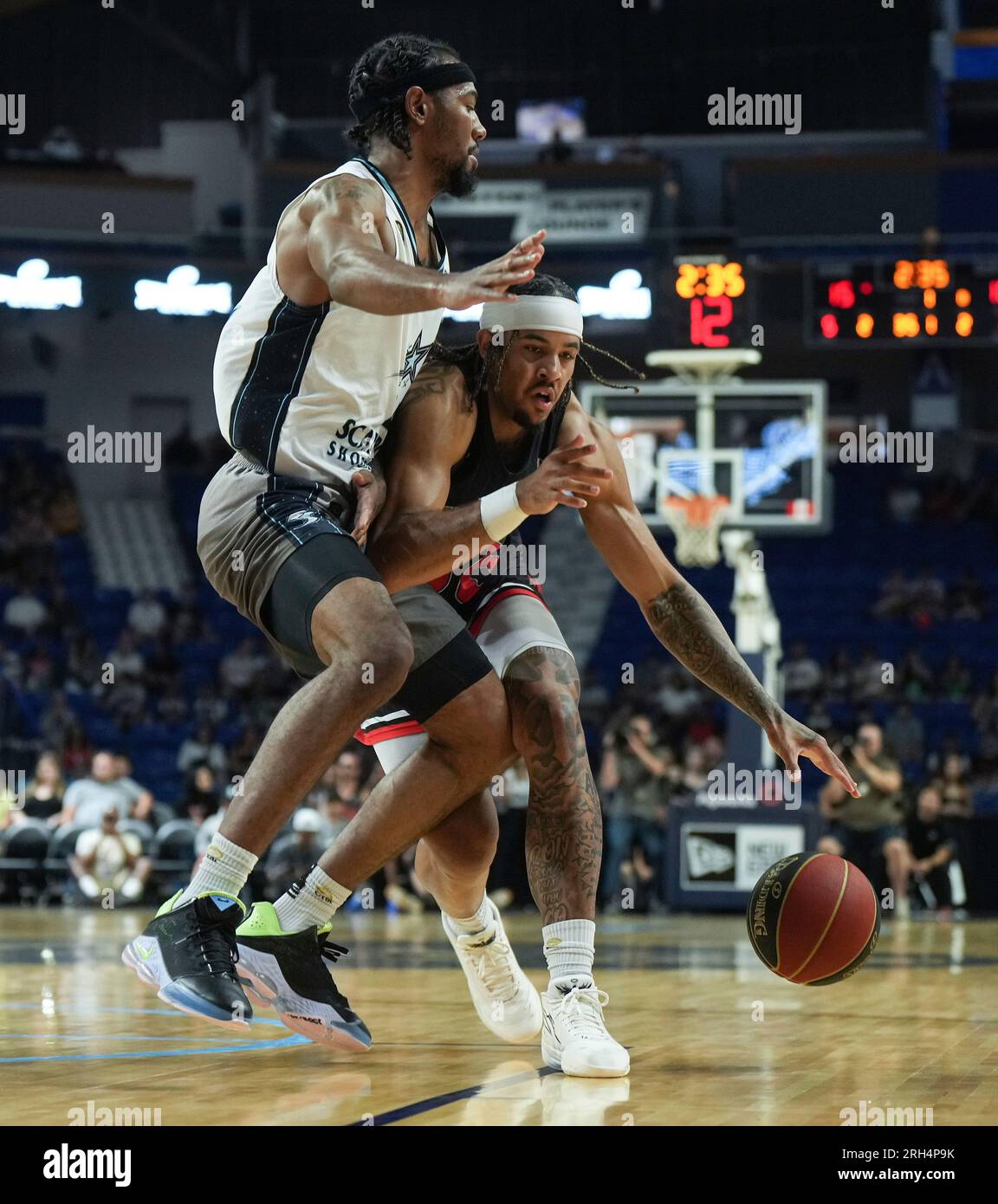 Calgary Surge's Sean Miller-Moore, right, moves the ball past ...