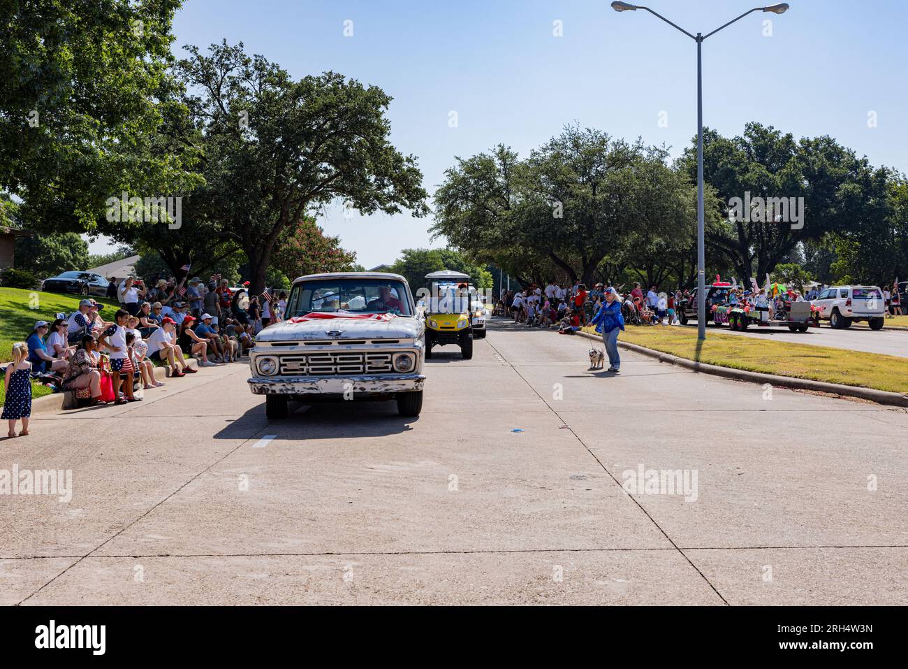 Texas, JUL 4 2023 - Sunny view of a July 4th community parade in Dallas ...