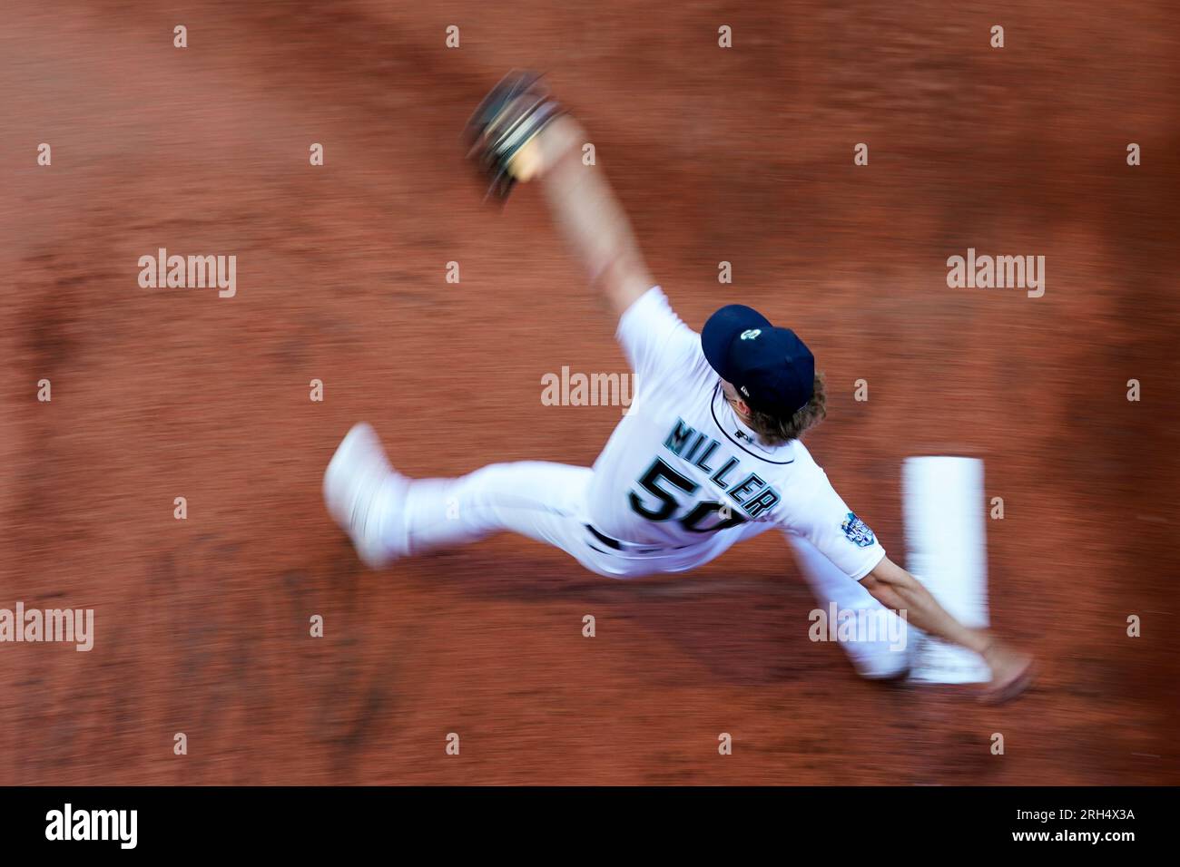 Seattle Mariners starting pitcher Bryce Miller warms up in the bullpen ...