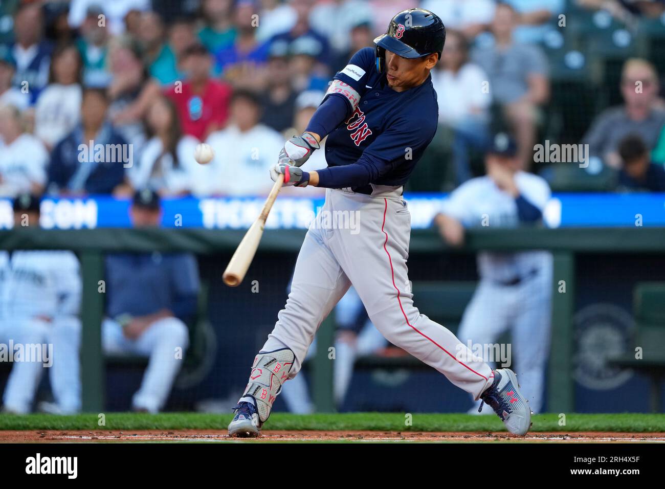 Boston Red Sox's Masataka Yoshida swings at a pitch against the Seattle Mariners during a ...