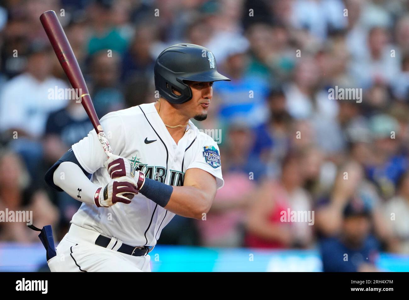 Seattle Mariners' Josh Rojas follows through against the Boston Red Sox ...