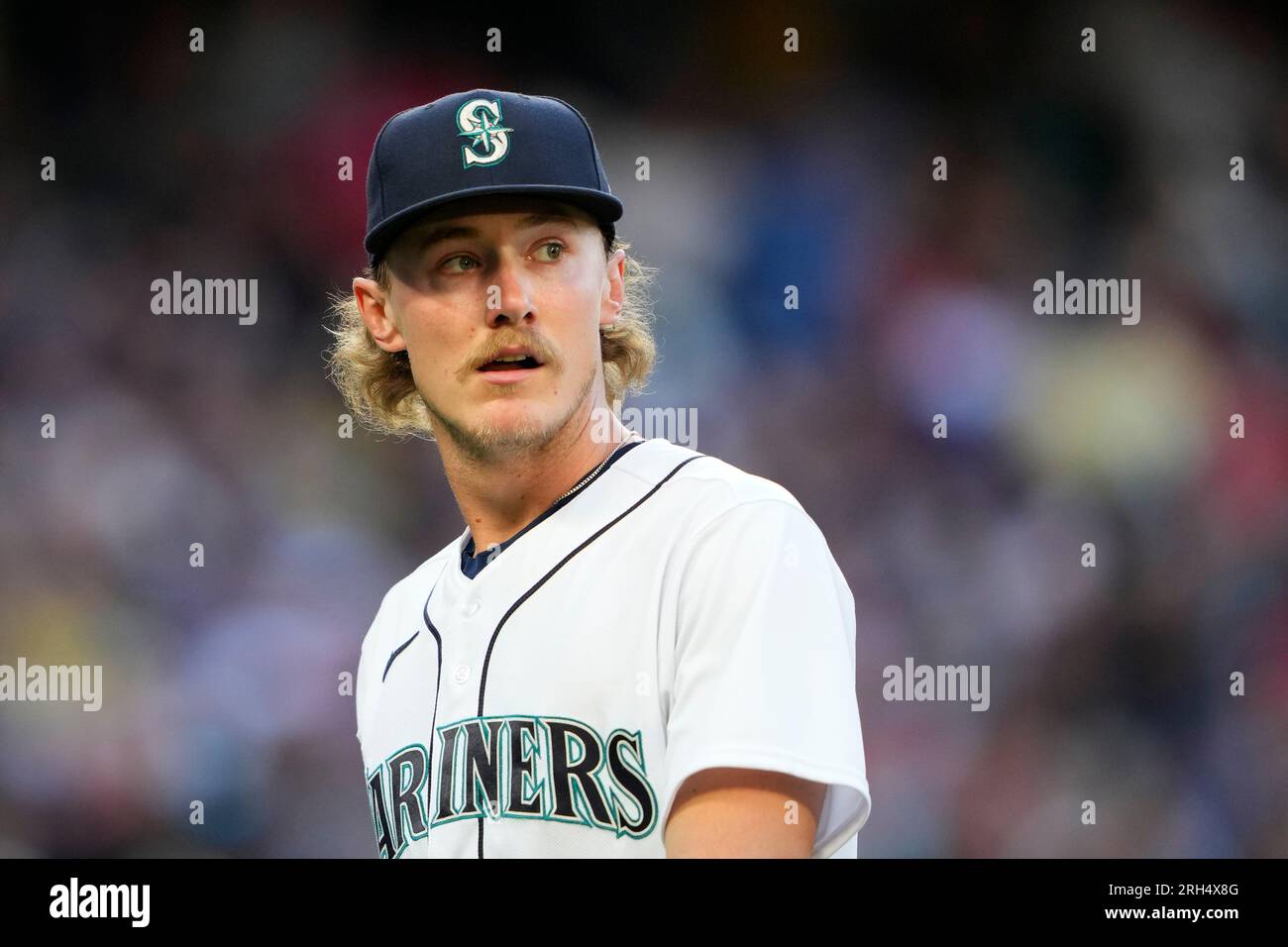 Seattle Mariners starting pitcher Bryce Miller looks on during a ...