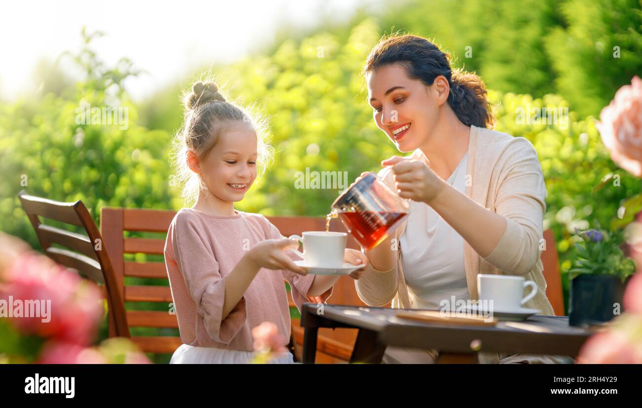 Child girl tea cups hi-res stock photography and images - Alamy