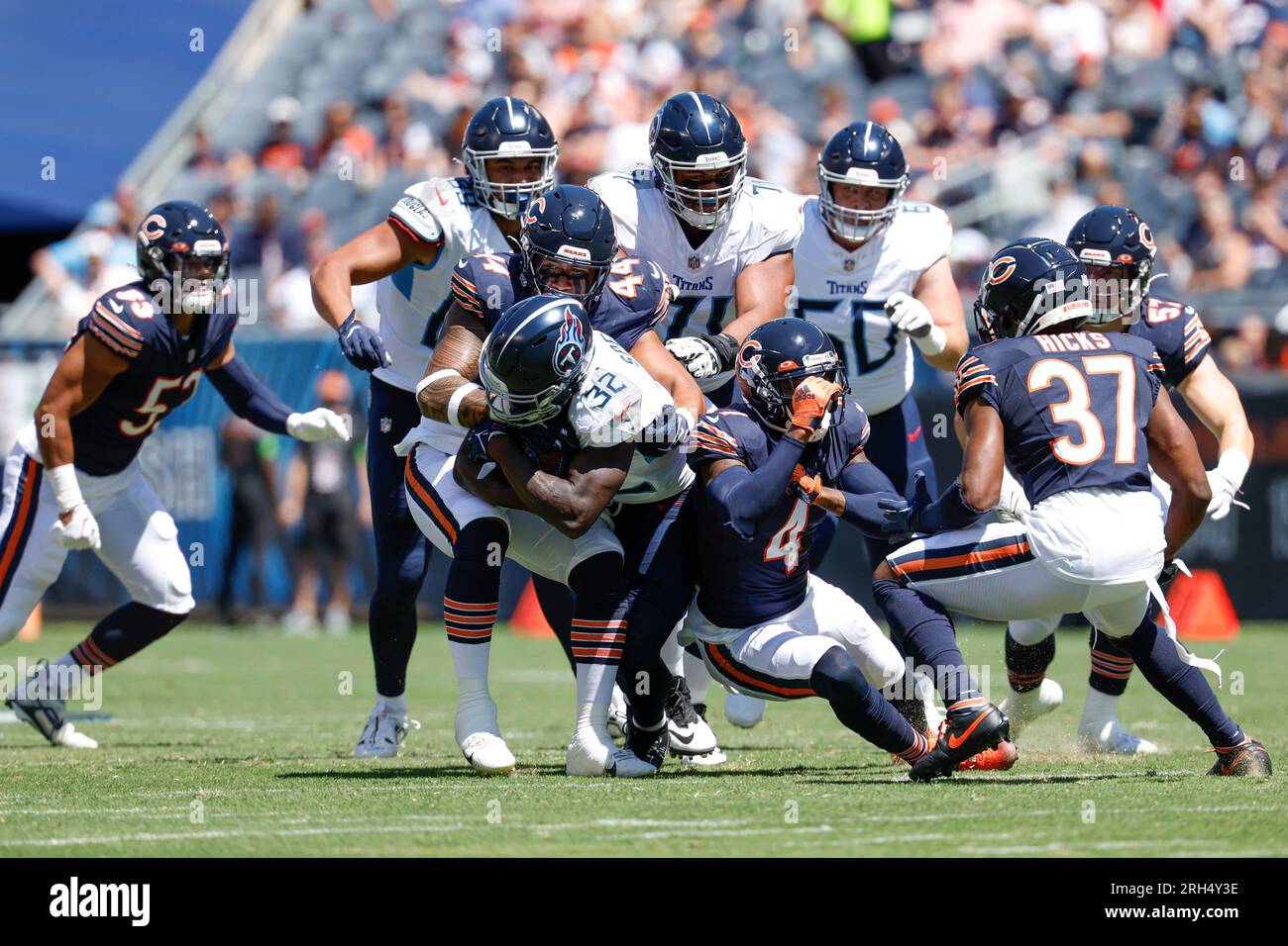 Tennessee Titans running back Tyjae Spears (32) is tackled by Chicago ...