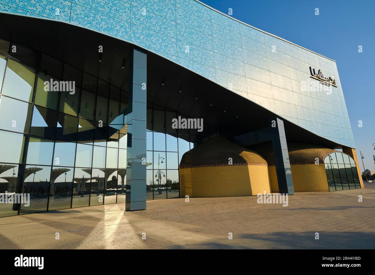 The light blue tile exterior facade view of the building. At Uly Dala ...
