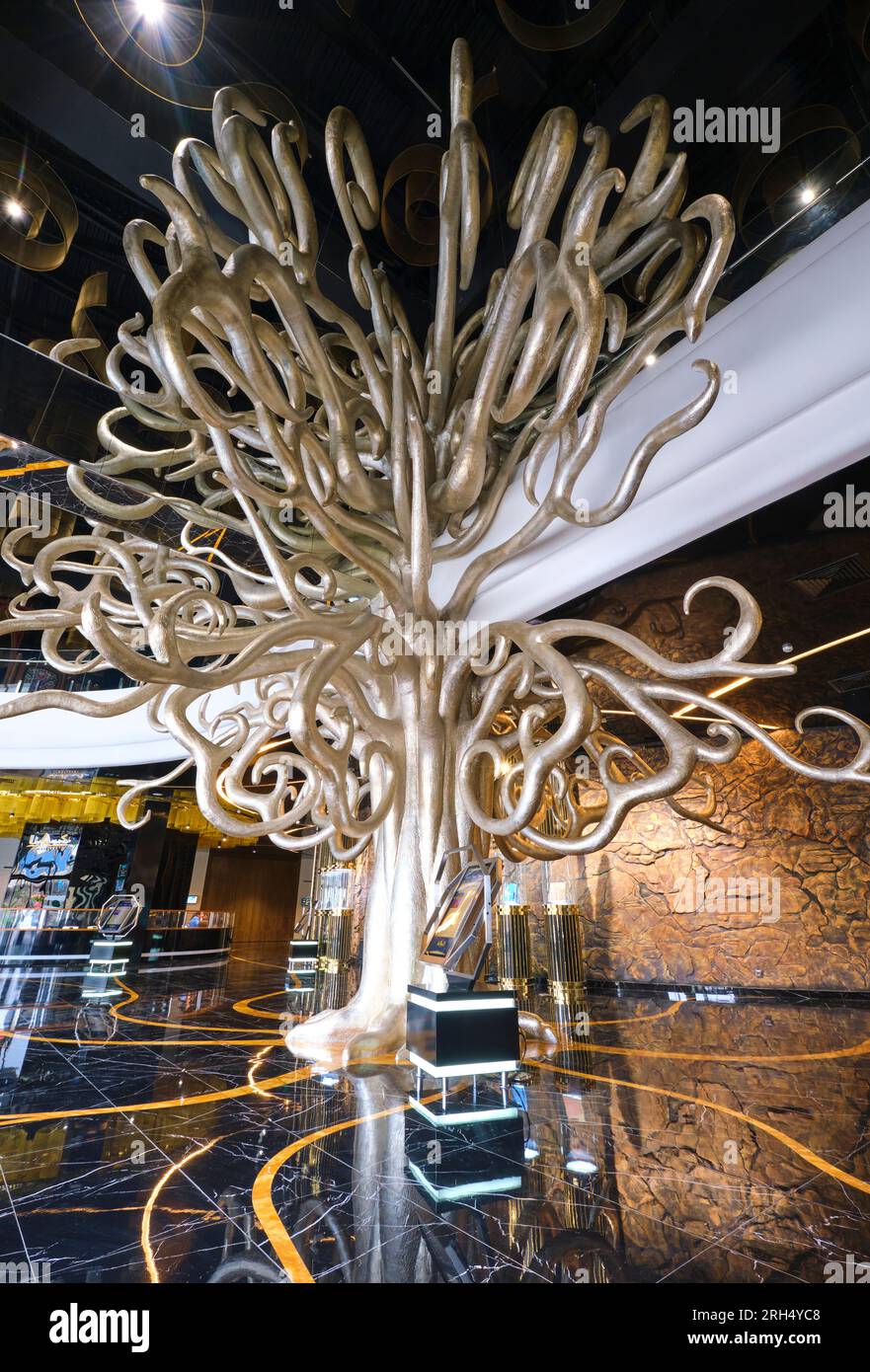 In the main entrance lobby is a large, metal, abstract tree sculpture ...