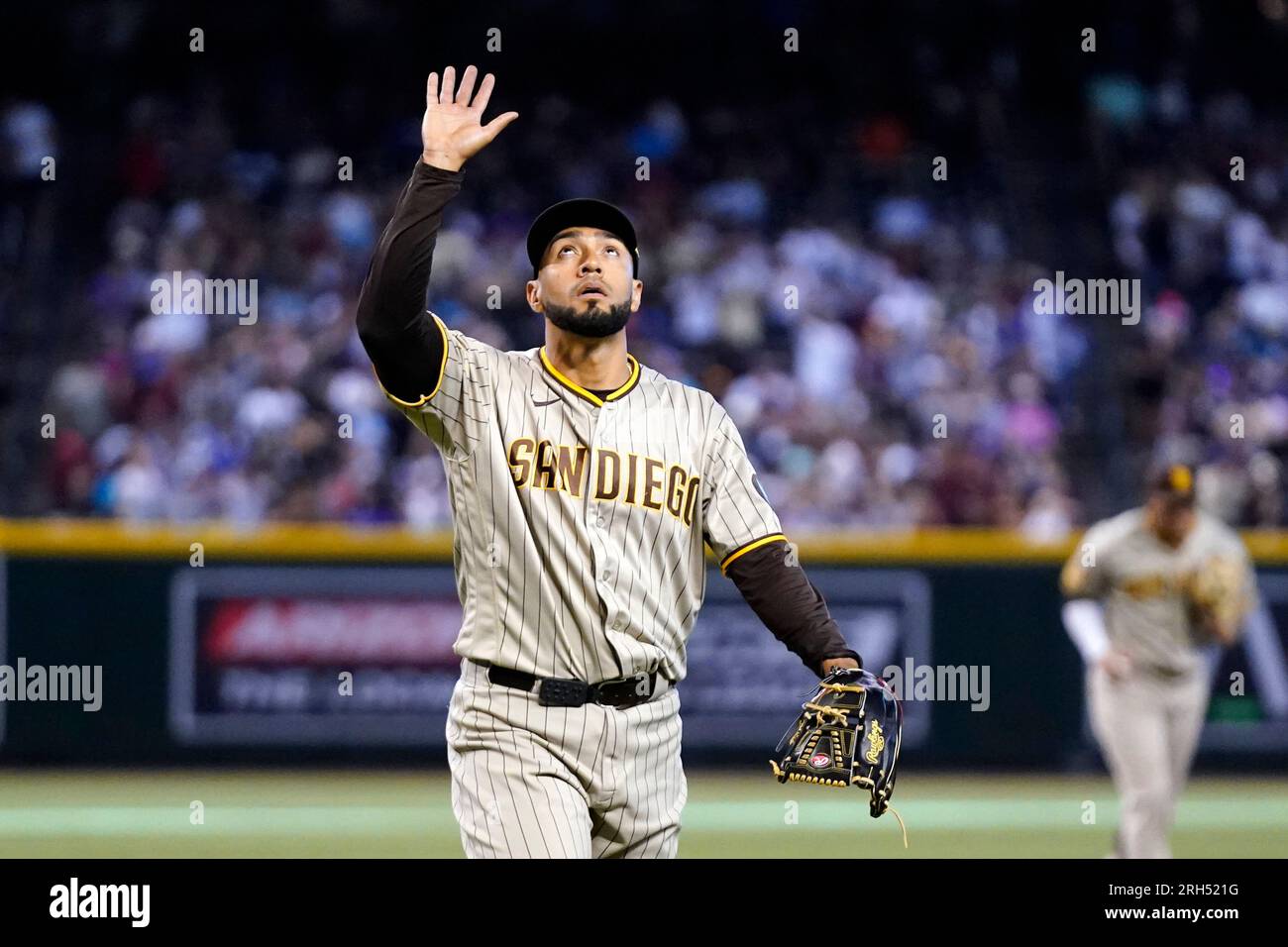 San Diego Padres relief pitcher Robert Suarez looks to the sky after ...