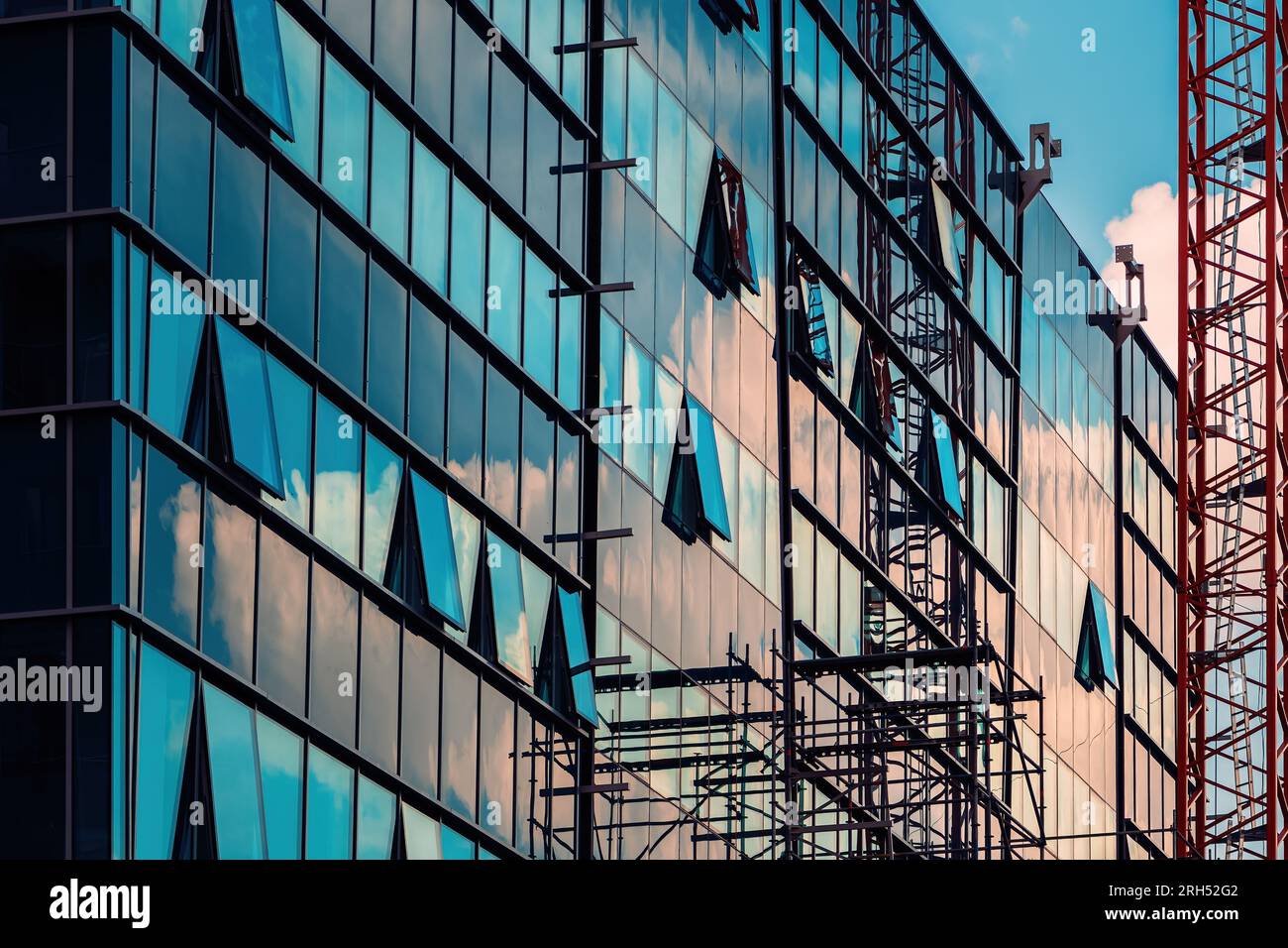 Reconstruction of modern office building with glass facade ...