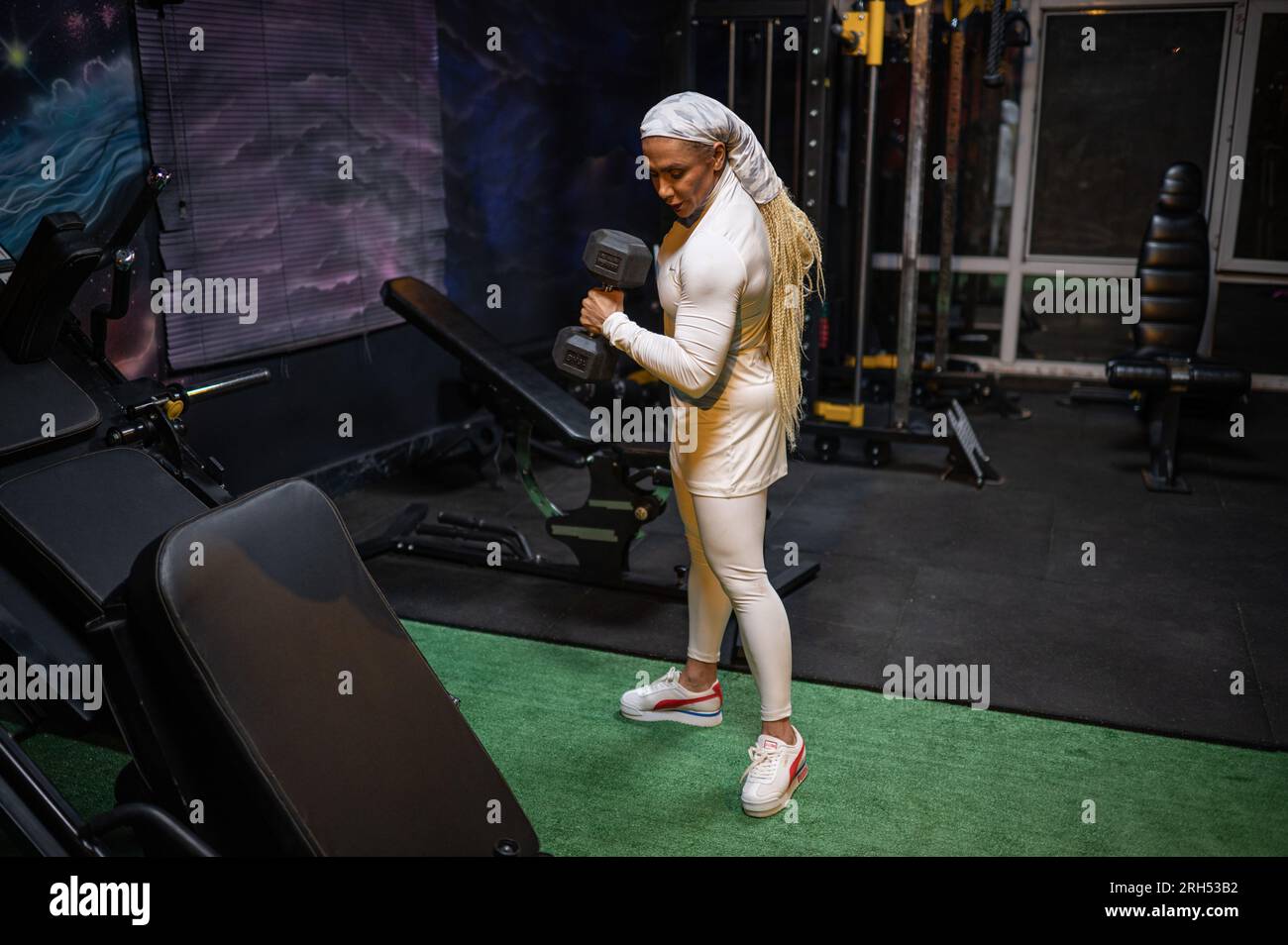 Teheran, Iran. 10th Aug, 2023. Sara Mustafanejad, bodybuilder, poses in ...