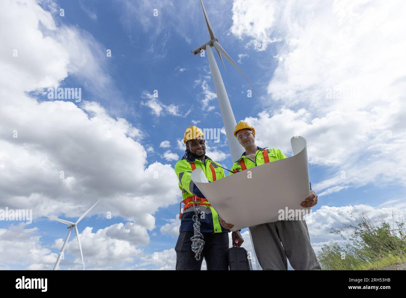 Wind turbine engineer technician male team working service maintenance ...