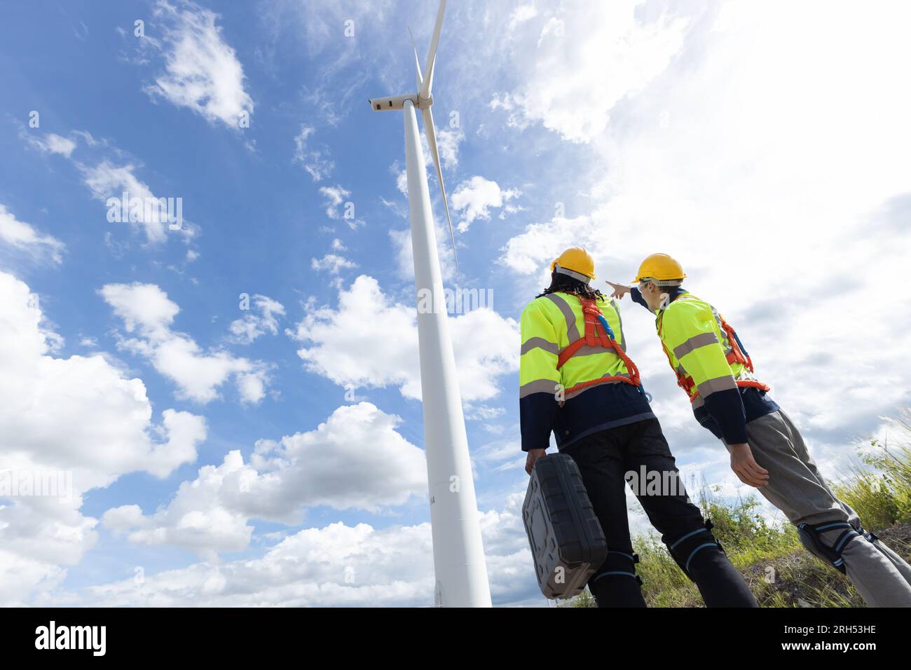 Wind turbine engineer technician male team working service maintenance ...