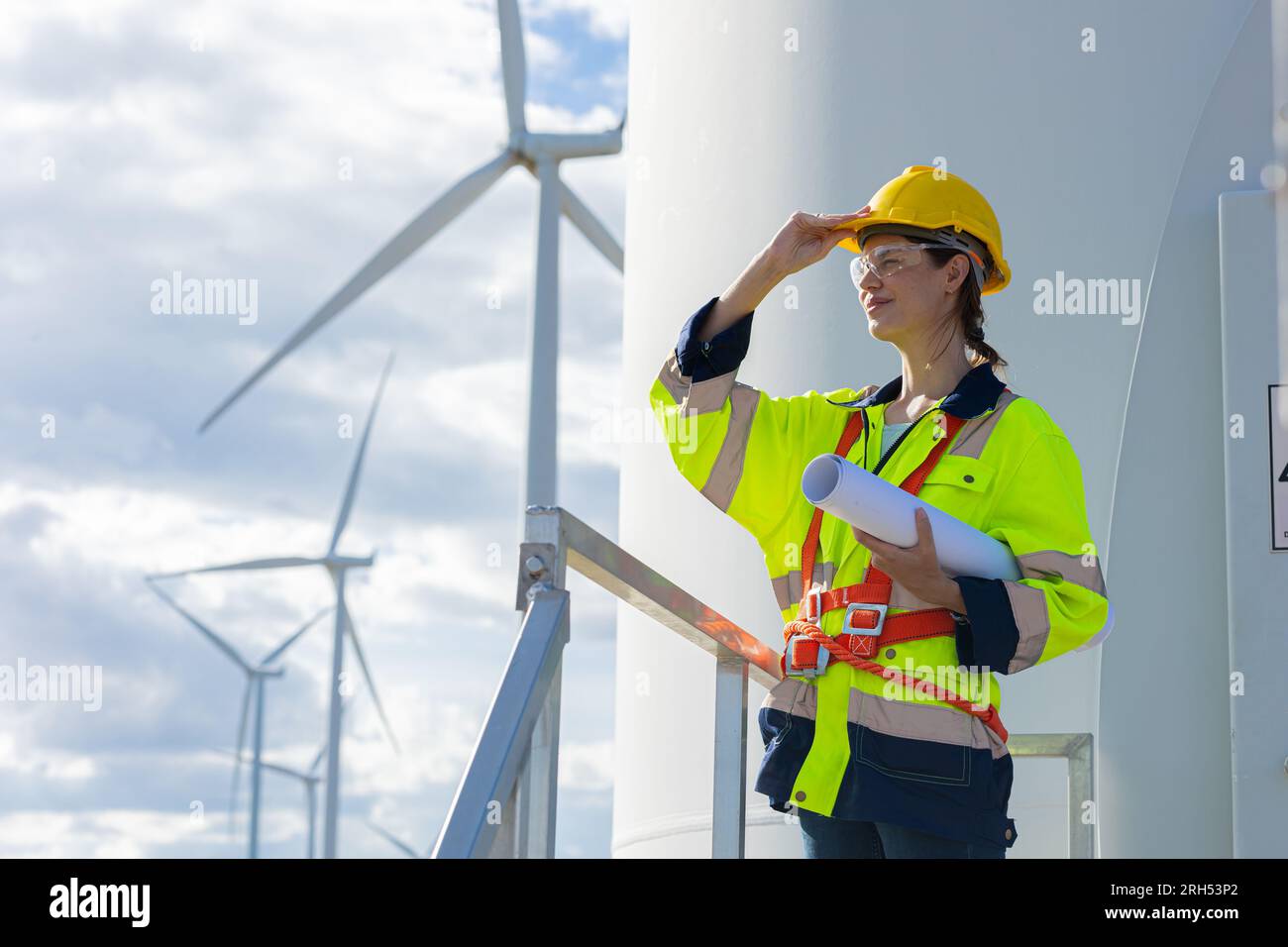 Engineer woman technician portrait working service wind turbine ...